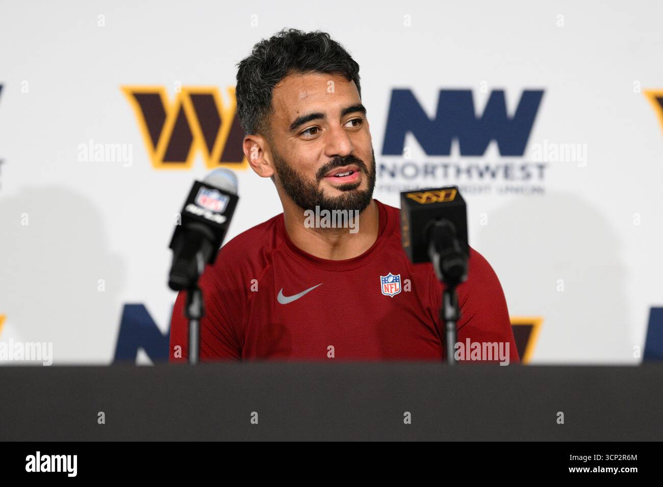 Washington Commanders quarterback Marcus Mariota speaks during a news ...