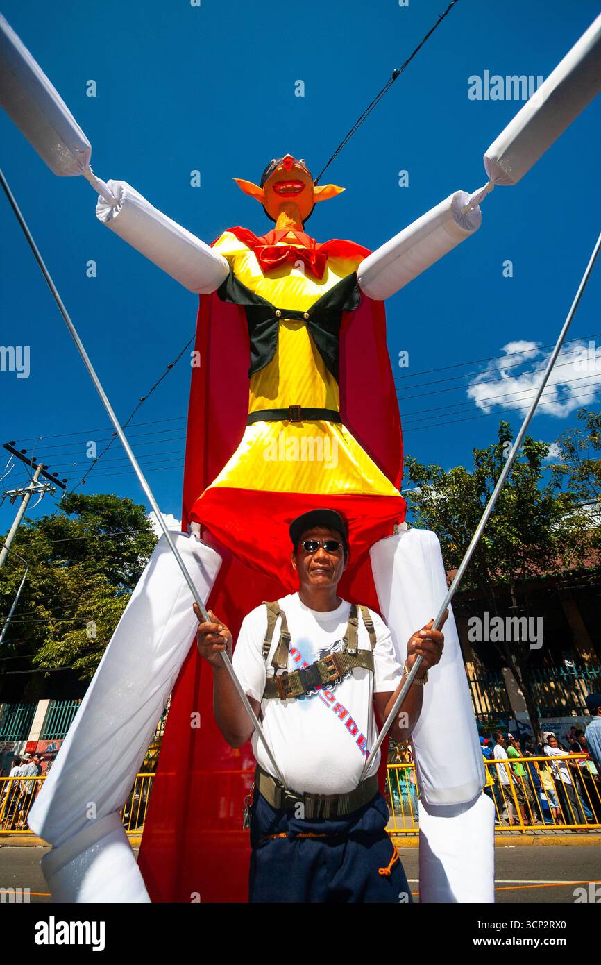 A man operating an effigy or higante, one of the attractions during the ...