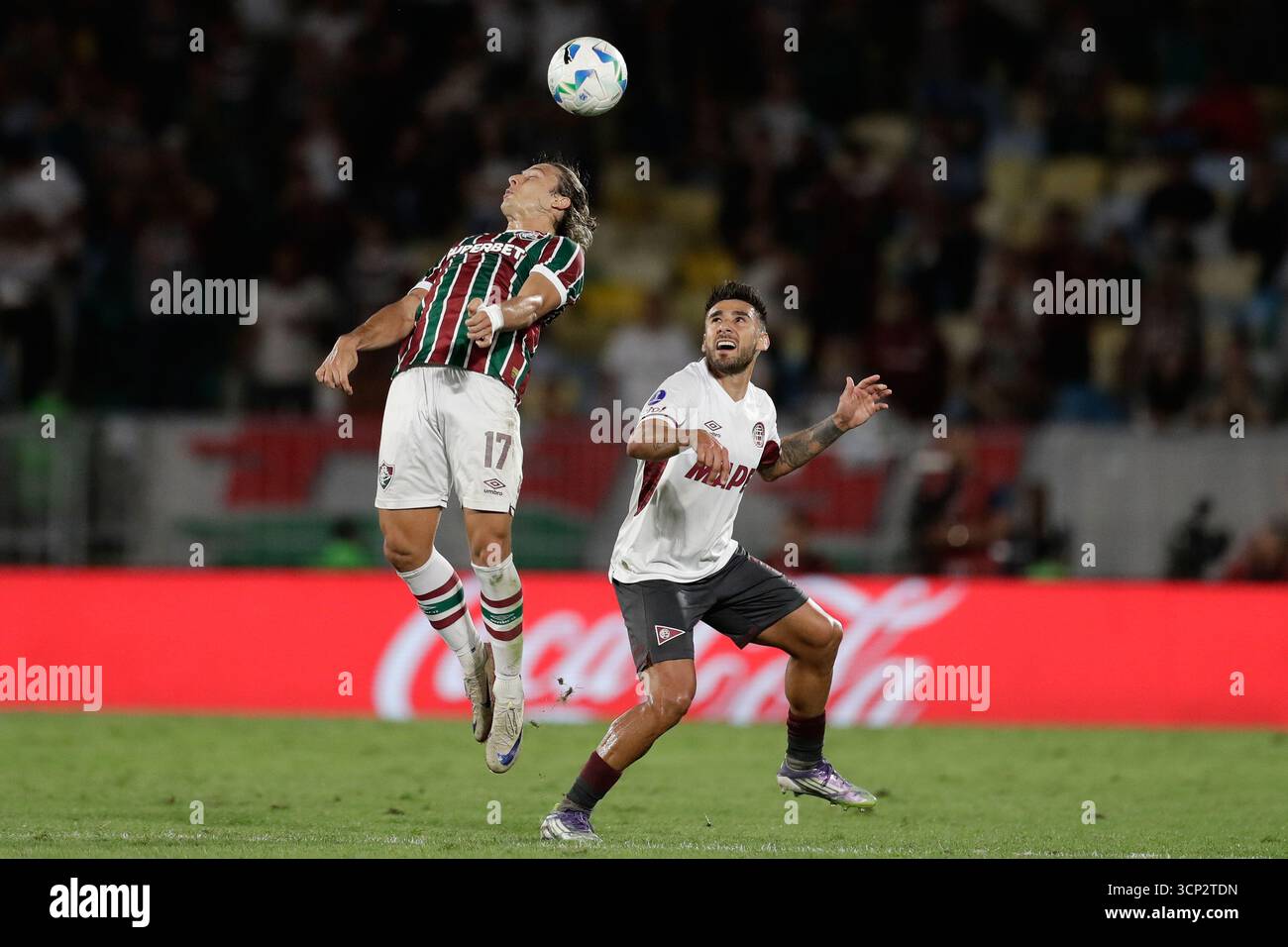 Agustin Canobbio of Brazil's Fluminense jumps for a header challenged ...