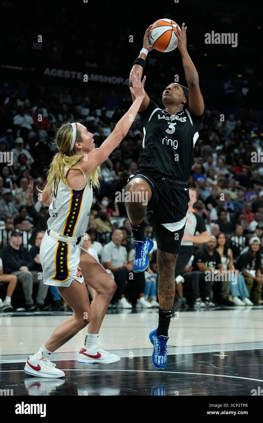 Las Vegas Aces forward NaLyssa Smith (3) shoots over Indiana Fever ...