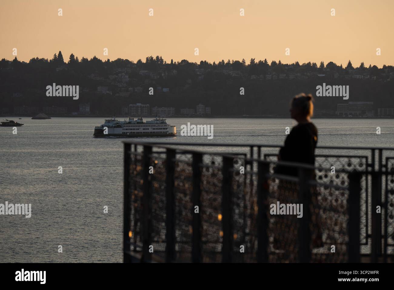 Seattle, USA. 23 Sep, 2025. A smokey sunset over Elliott Bay. Climate ...