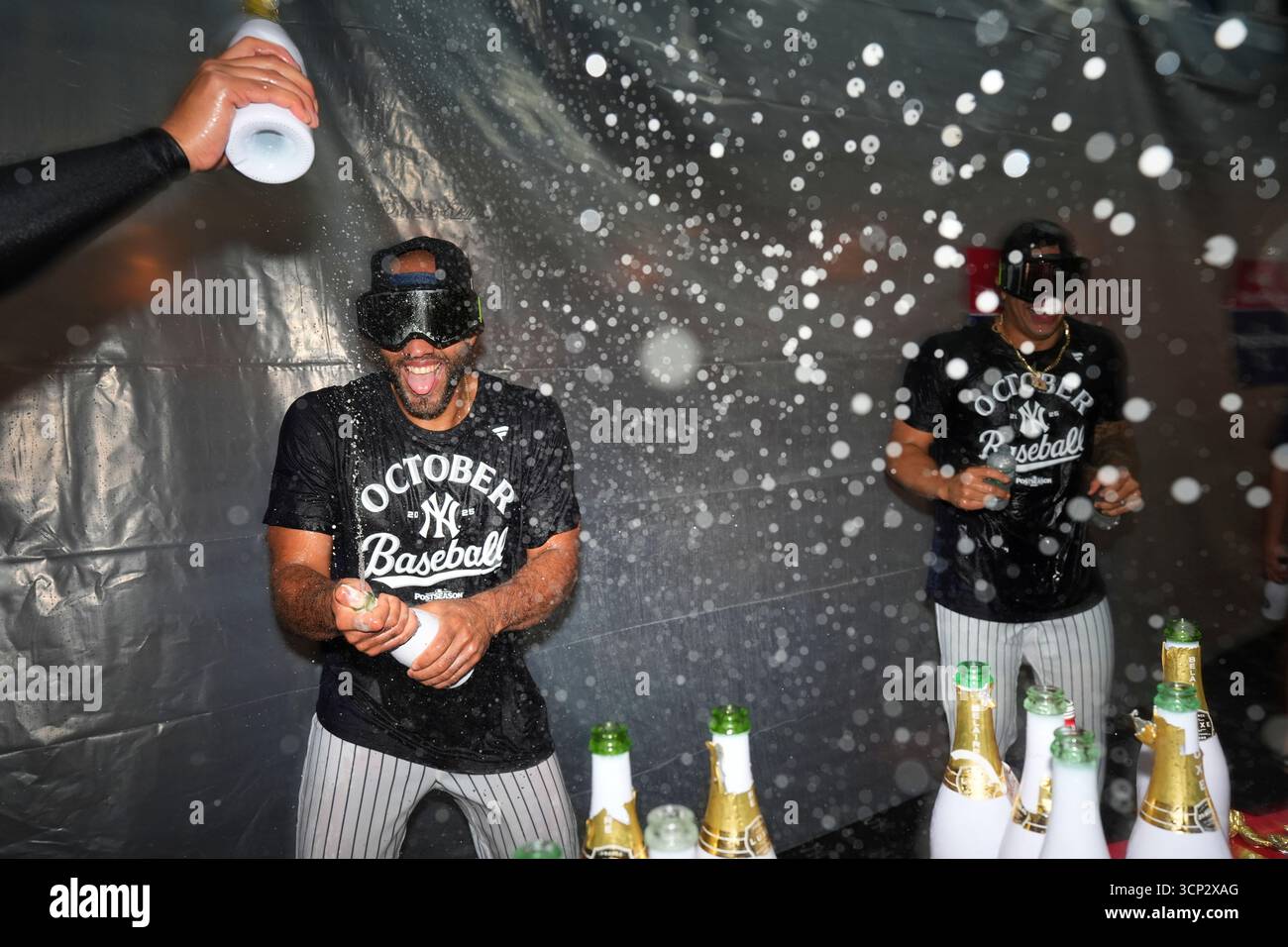 The New York Yankees celebrate after they clinched playoff berth a ...