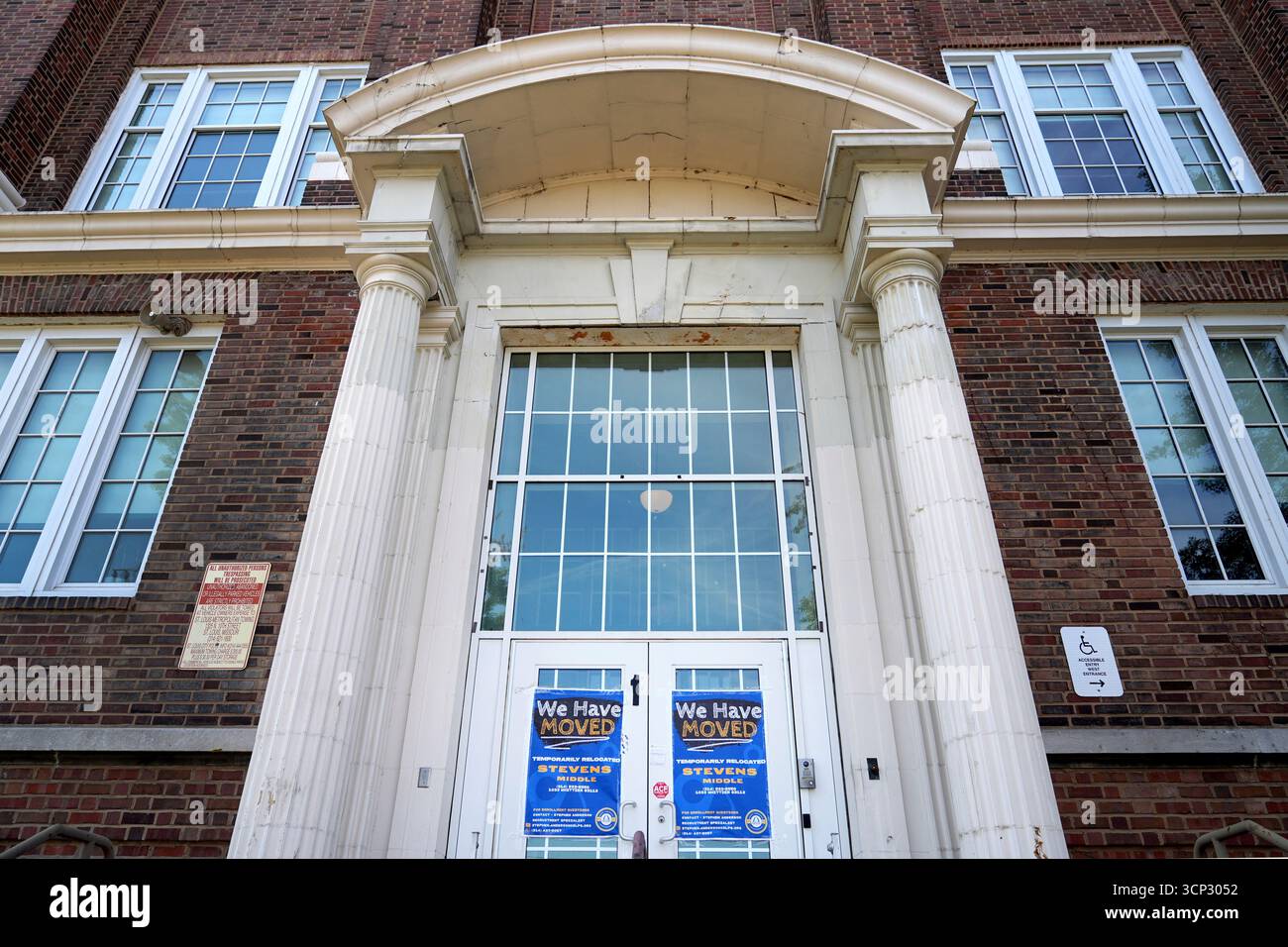 Signs on the front doors of Sumner High School alert visitors classes ...