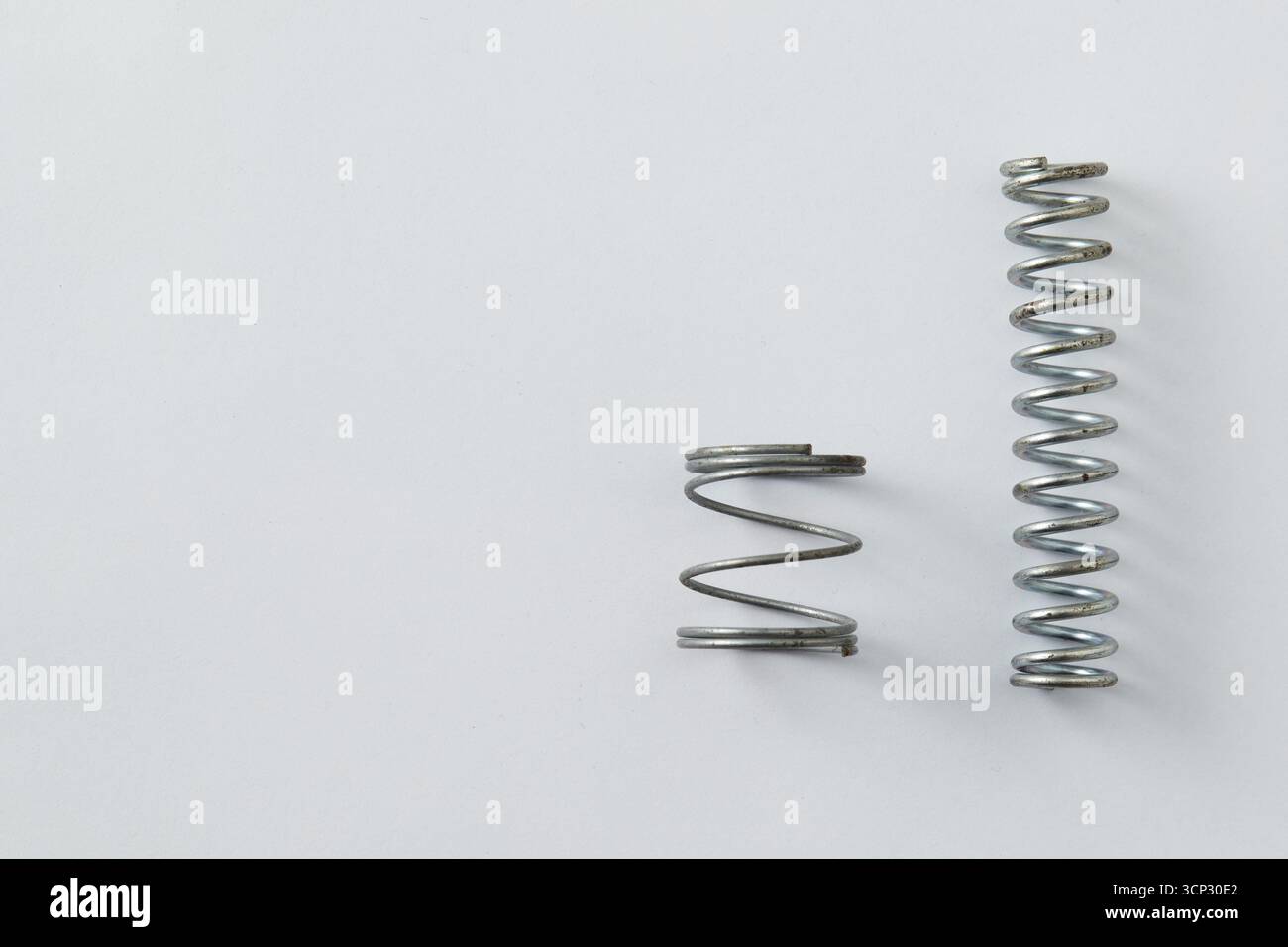 Two short springs hi-res stock photography and images - Alamy