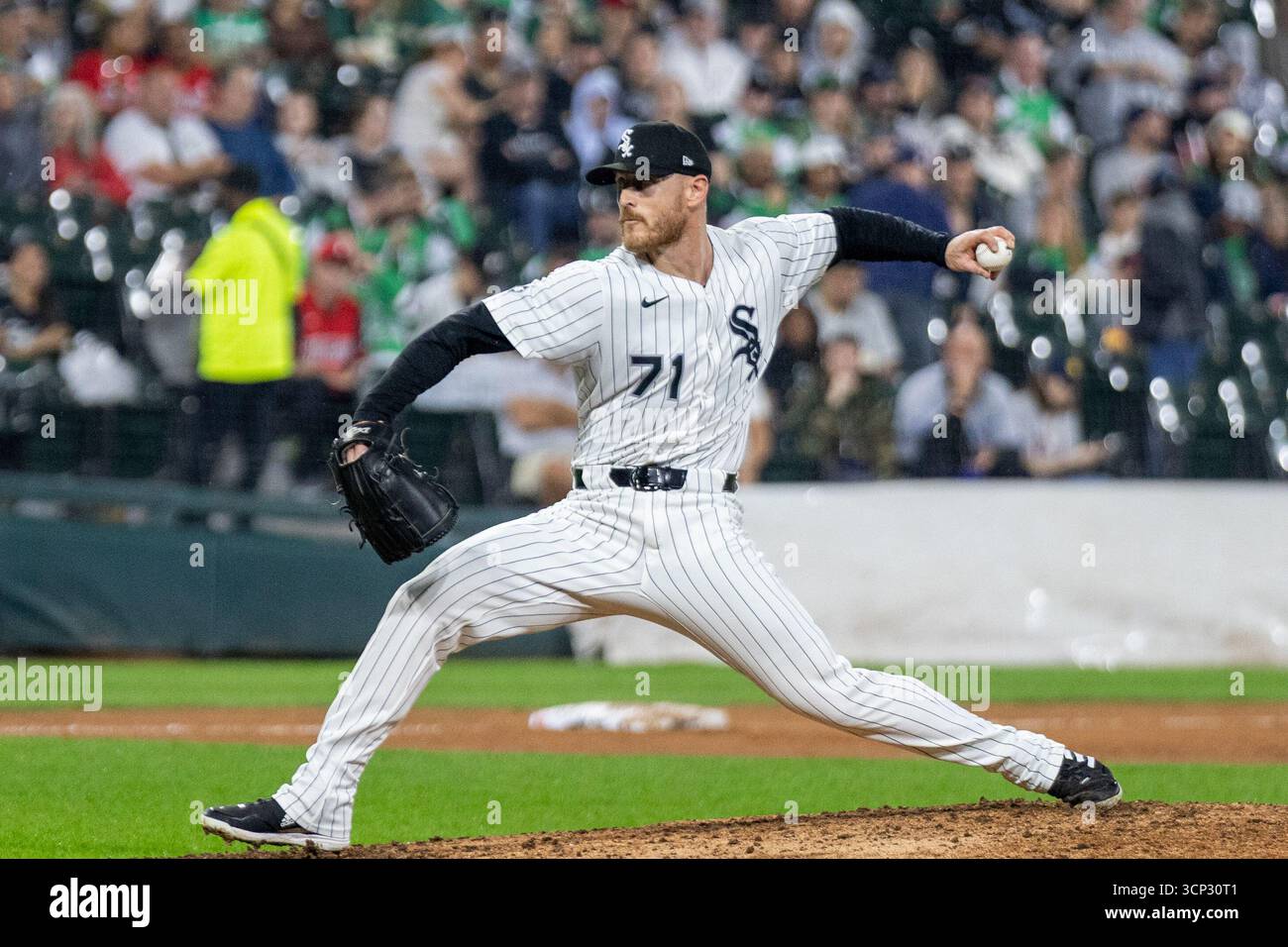 Chicago White Sox pitcher Cam Booser (71) pitches the ball during the ...