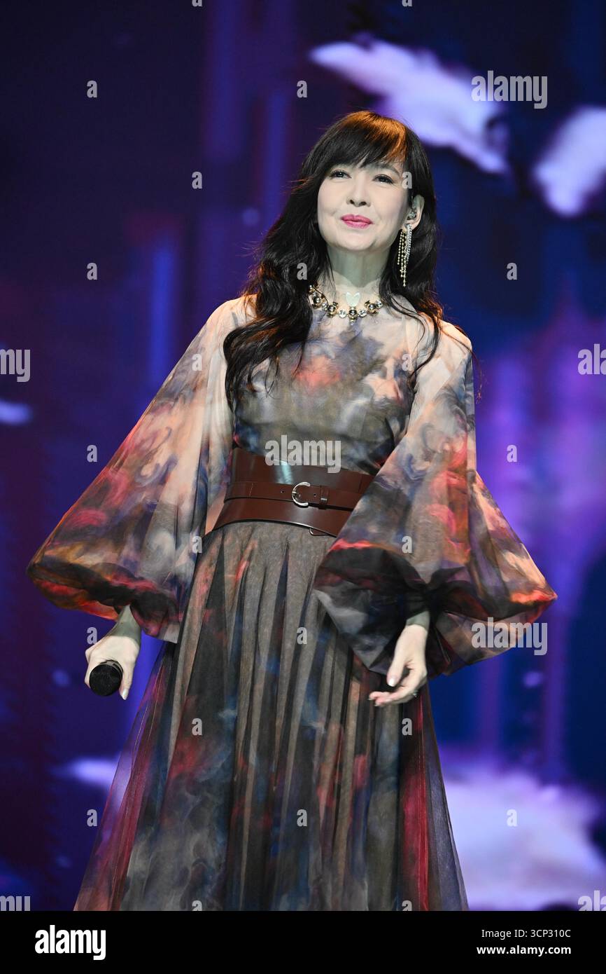 Hong Kong-based Cantopop singer-songwriter and actress Vivian Chow attends an activity in ...