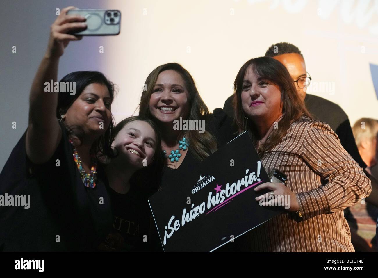 Arizona Democratic candidate Adelita Grijalva, center, poses for a ...