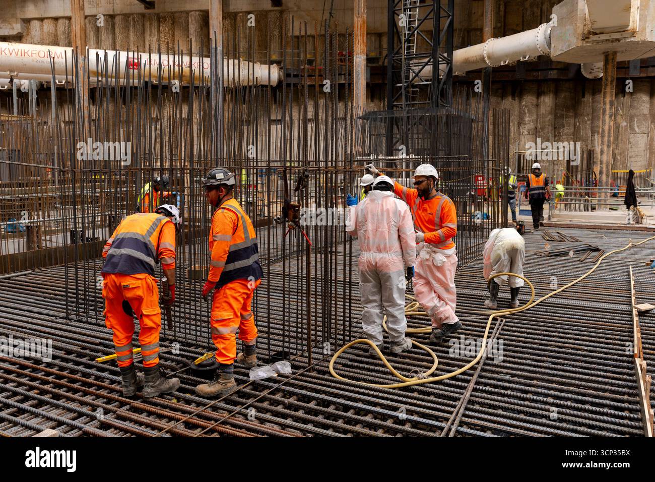 Workers on site as the 700-year-old tower of All Hallows Staining ...