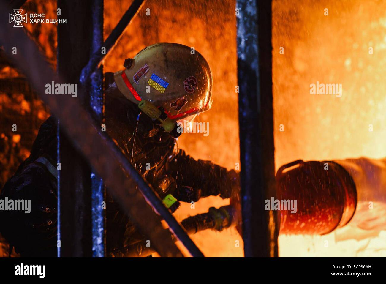 In this photo provided by the Ukrainian Emergency Service, firefighters ...