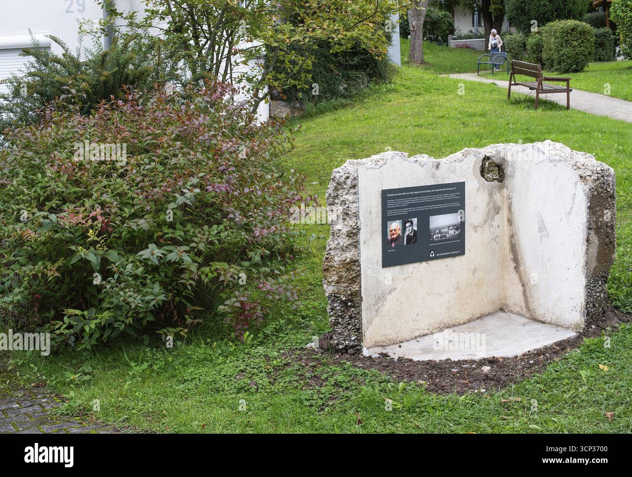 Memorial plaque with photos of a former concentration camp inmate ...