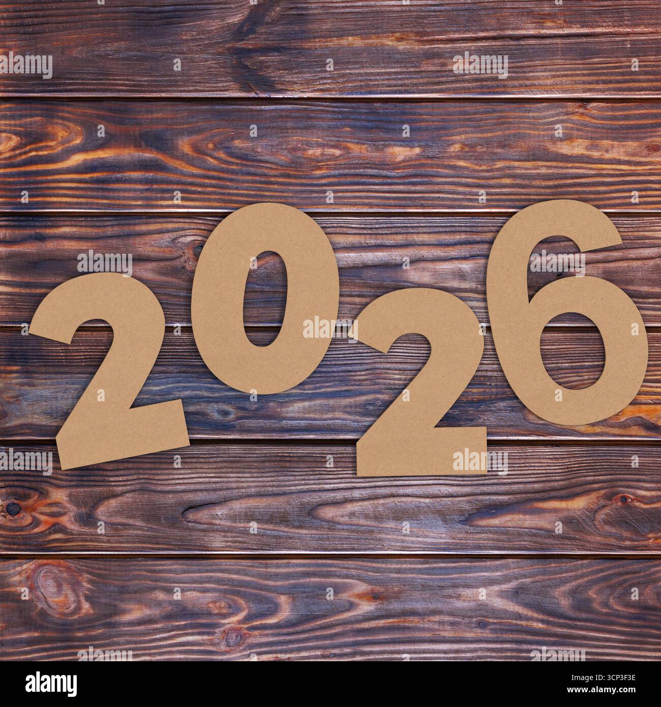 Cardstock Numbers 2026 Happy New Year Sign over wooden table background ...