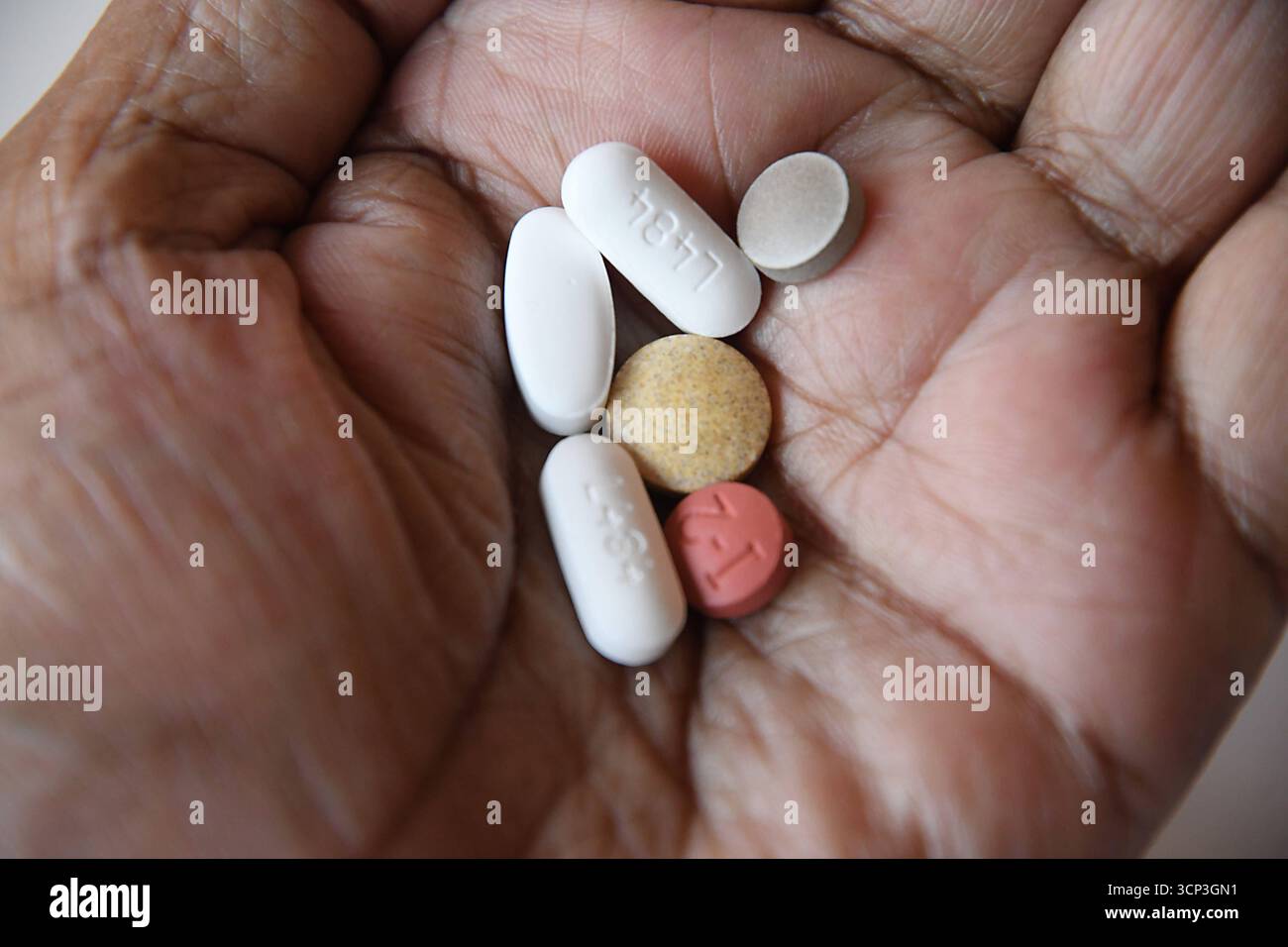 Copenhagen/ Denmark/24 SEPTEMBER 2025/Various medicne tablets on hand ...