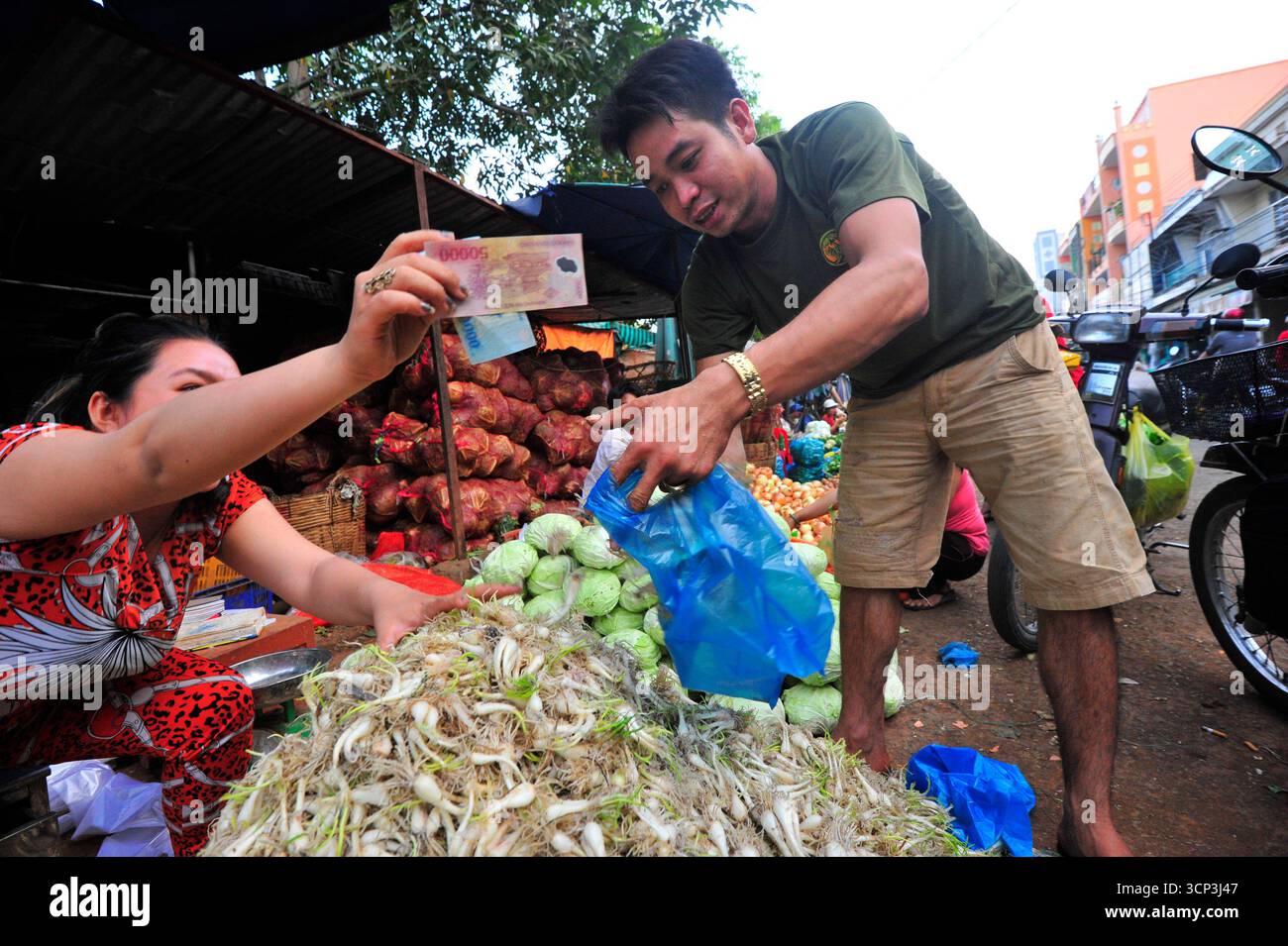 food on a vietnamese market, cooking and eating in vietnam food on a ...