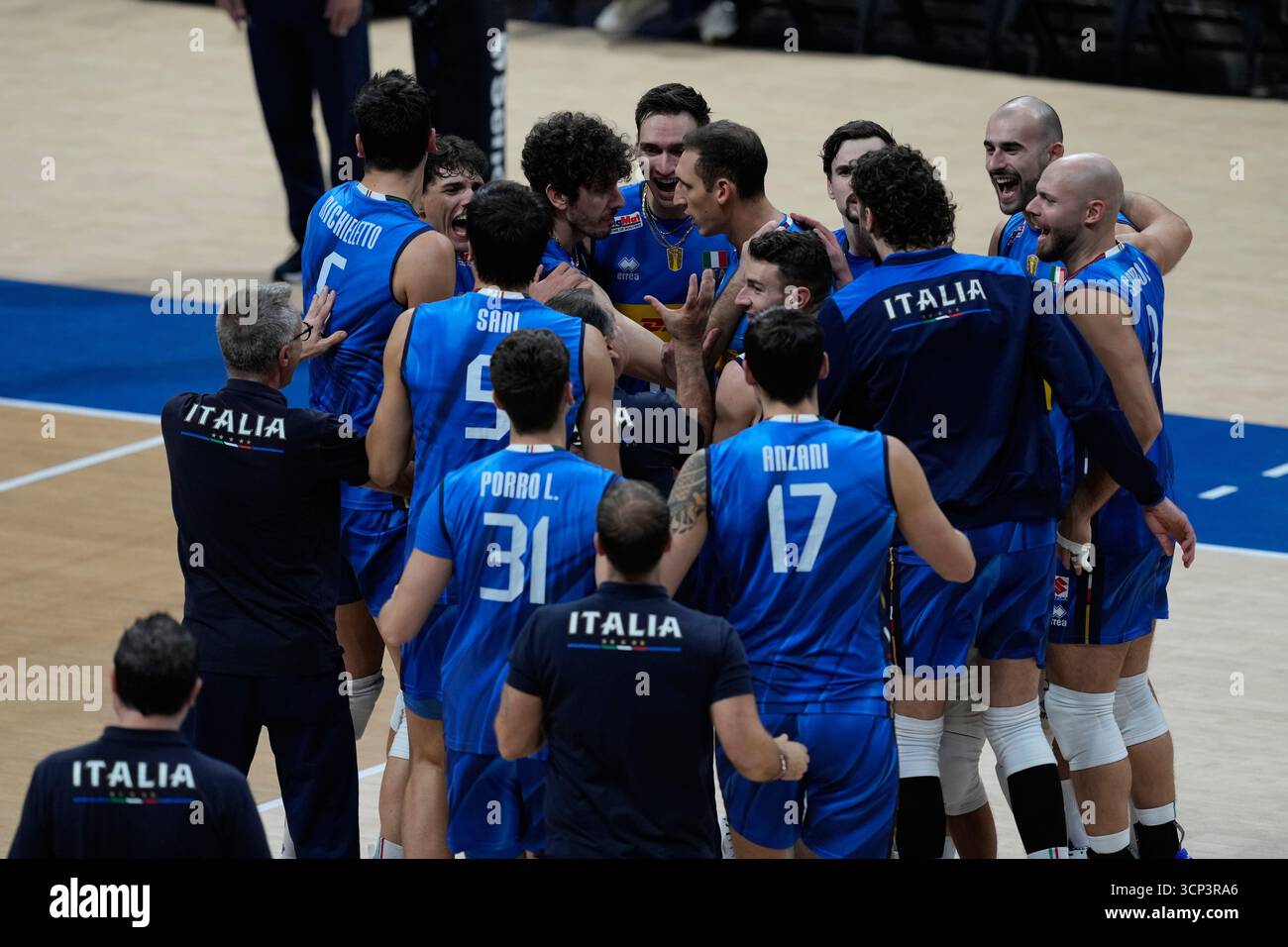 Members of Italy team celebrate after winning the quarter final match ...