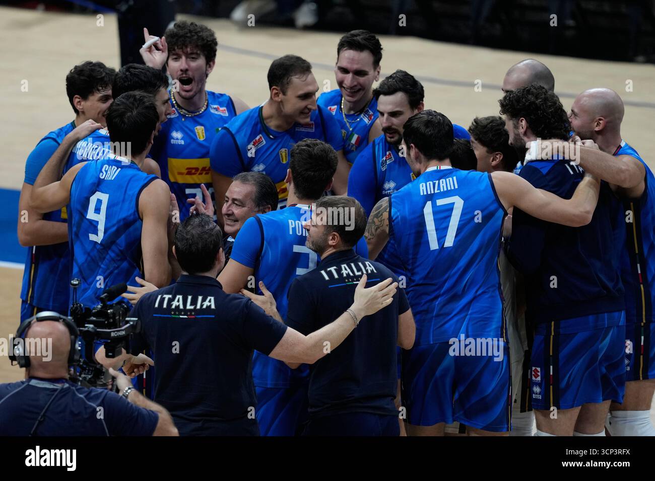 Members of Italy team celebrate after winning the quarter final match ...