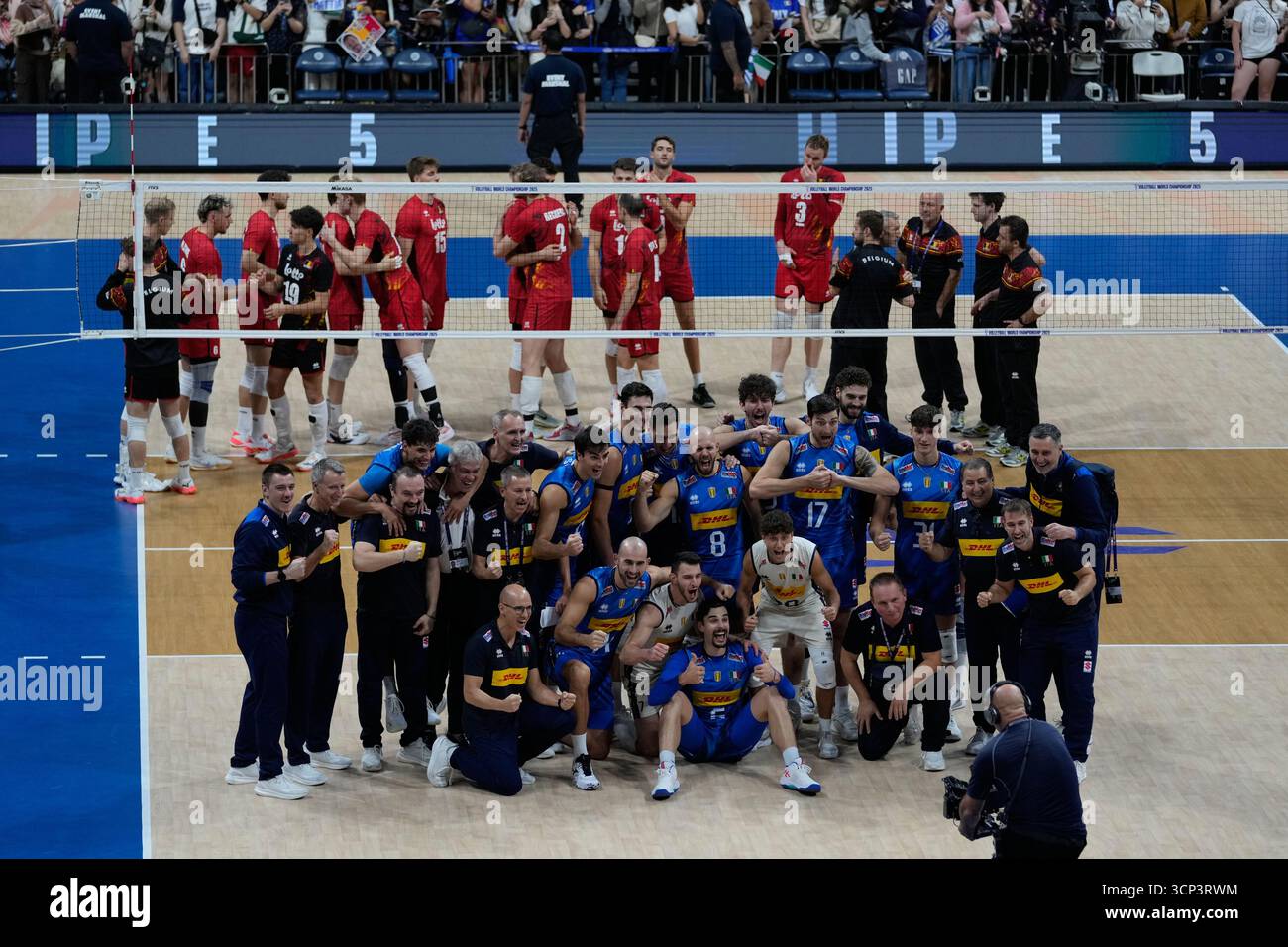 Members of Italy team celebrate after winning the quarter final match ...