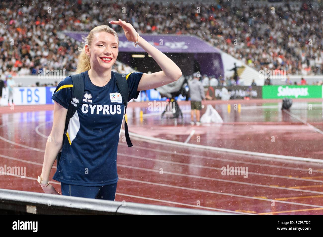 Elena Kulichenko (Cyprus) leaving the infield in the rain after the ...