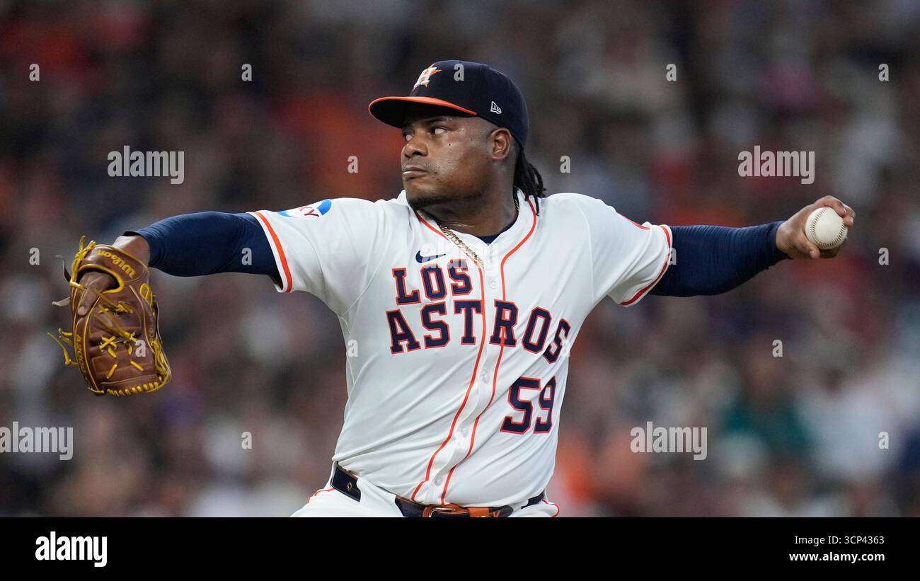 Houston Astros starting pitcher Framber Valdez throws a pitch against the Seattle Mariners ...