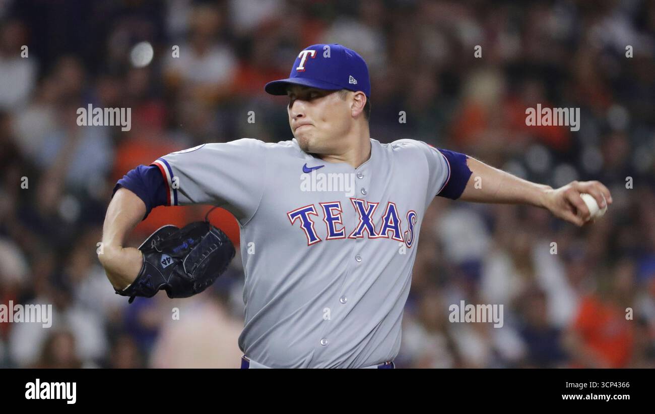 Texas Rangers relief pitcher Robert Garcia throws during a baseball ...