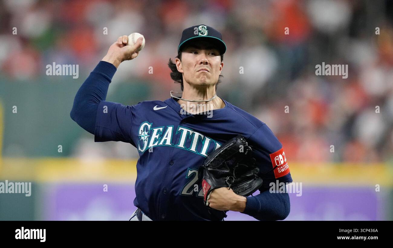 Seattle Mariners pitcher Bryan Woo (22) pitches during the first inning ...