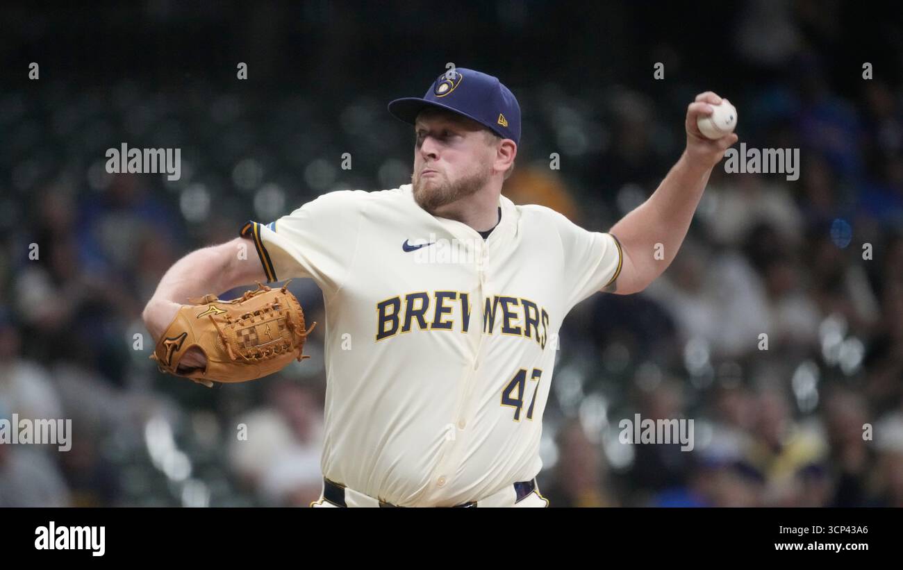 Milwaukee Brewers' Jared Koenig throws during the ninth inning of a ...
