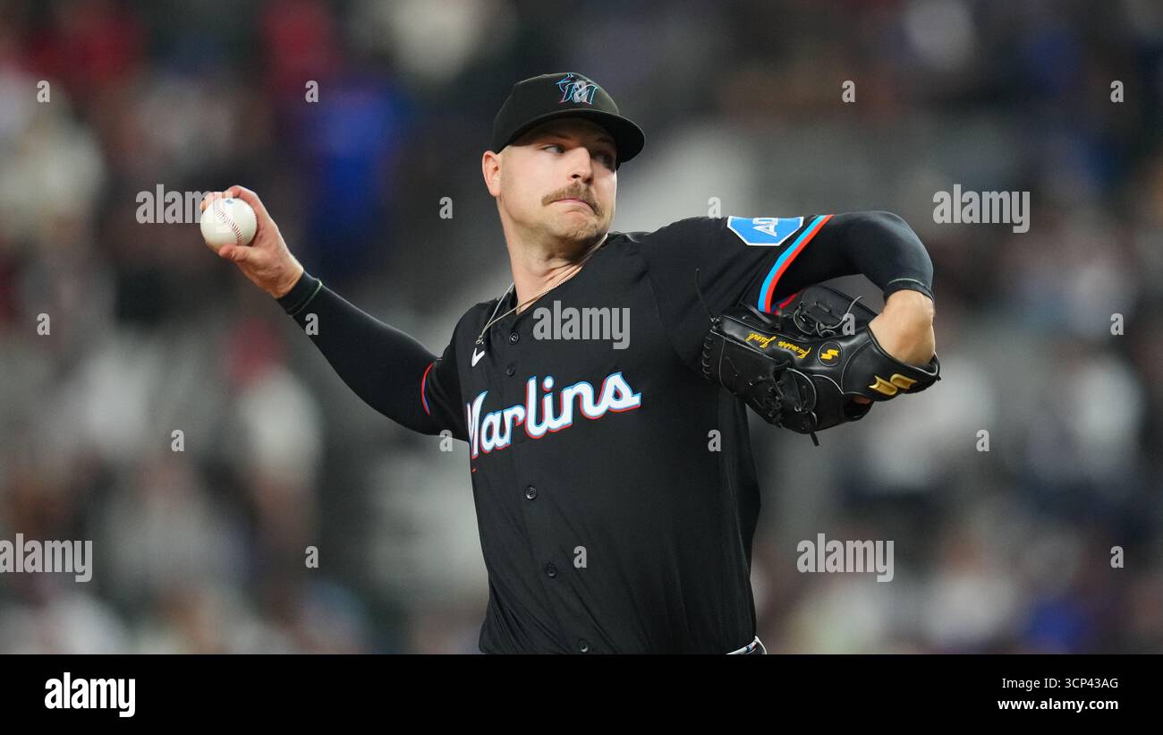 Miami Marlins starting pitcher Janson Junk throws to the Texas Rangers ...