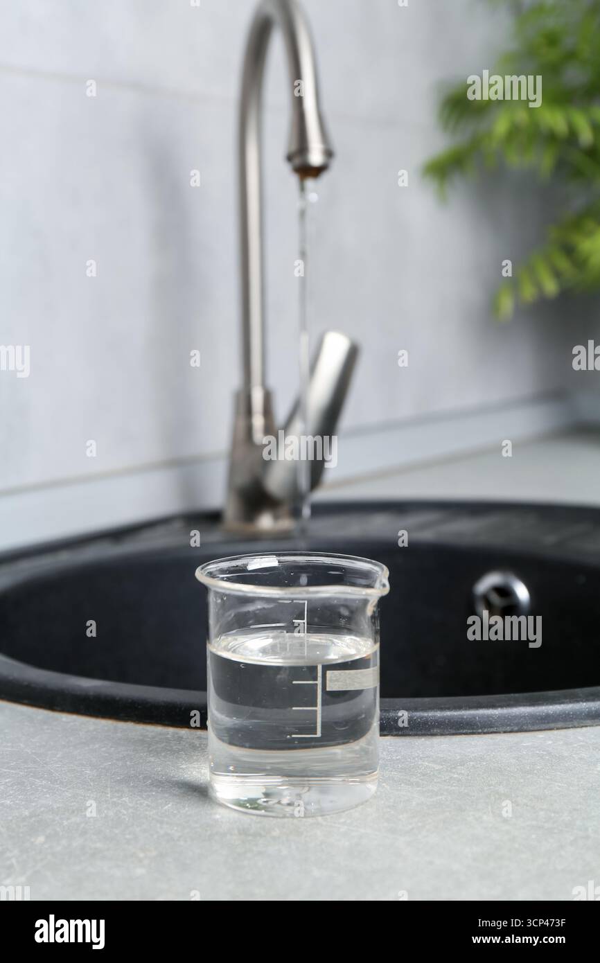 Sample water in beaker hi-res stock photography and images - Alamy