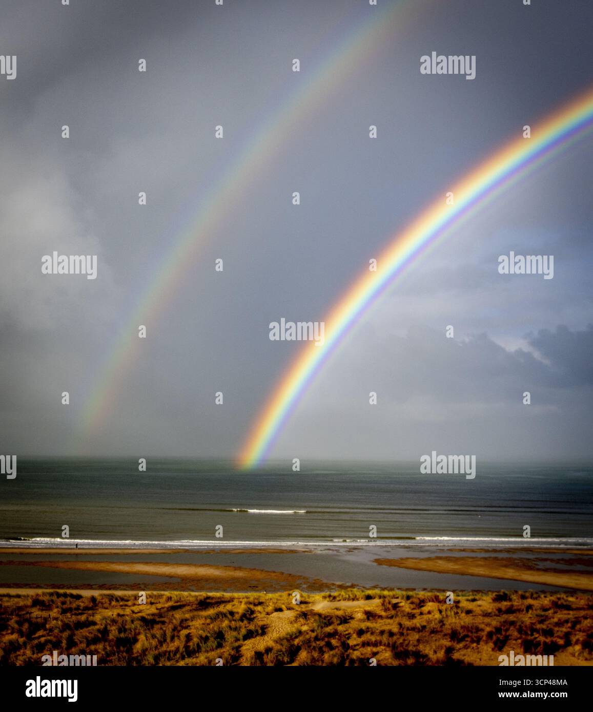 ROTTERDAM - A double rainbow of wind turbines dotted along the ...
