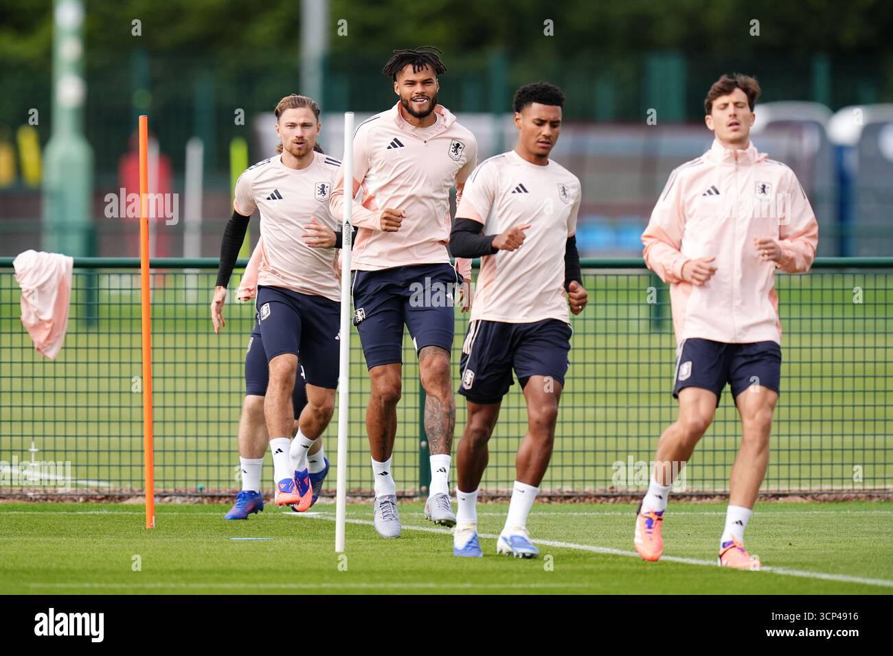 Aston Villa's Matty Cash (left), Ollie Watkins (centre right) Tyrone ...