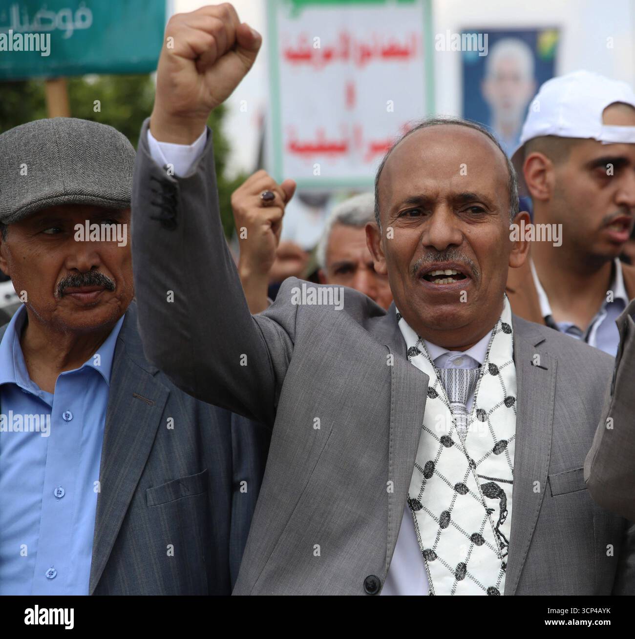 Pro-Palestinian rally in Sana a- A protester chants slogans during a ...