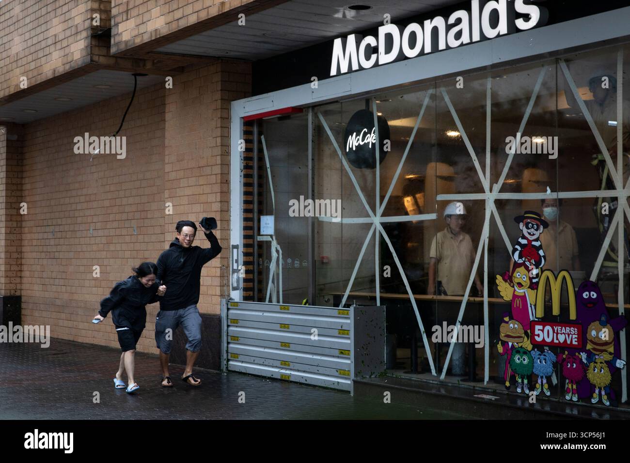 A couple went out to search for breakfast at Heng Fa Chuen, Hong Kong ...