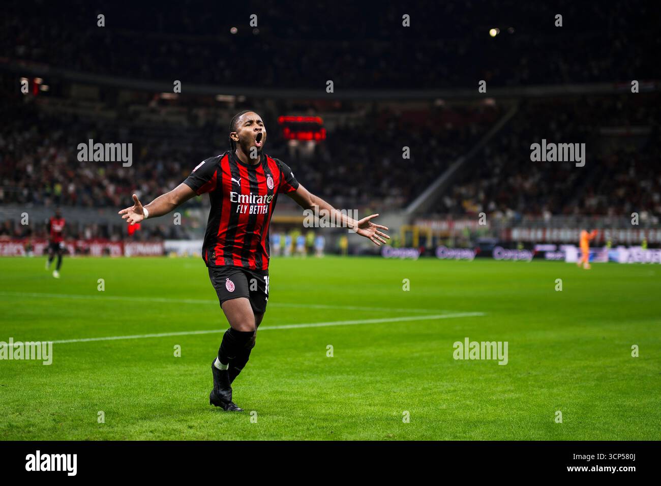 Christopher Nkunku of AC Milan celebrates after scoring a goal during ...