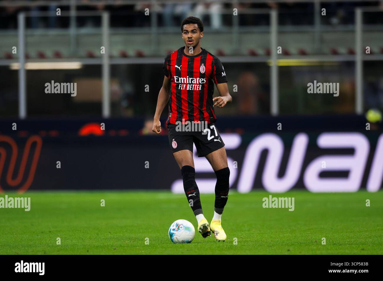 David Odogu of AC Milan in action during the Coppa Italia football ...