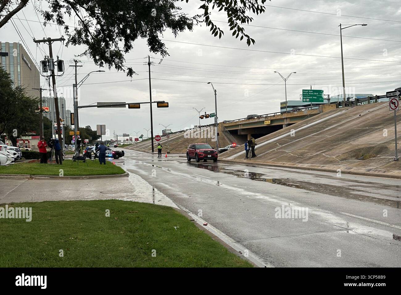 Police block off I-35E close to a U.S. Immigration and Customs ...