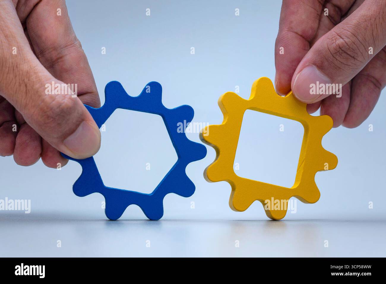 Cooperation interlock hi-res stock photography and images - Alamy