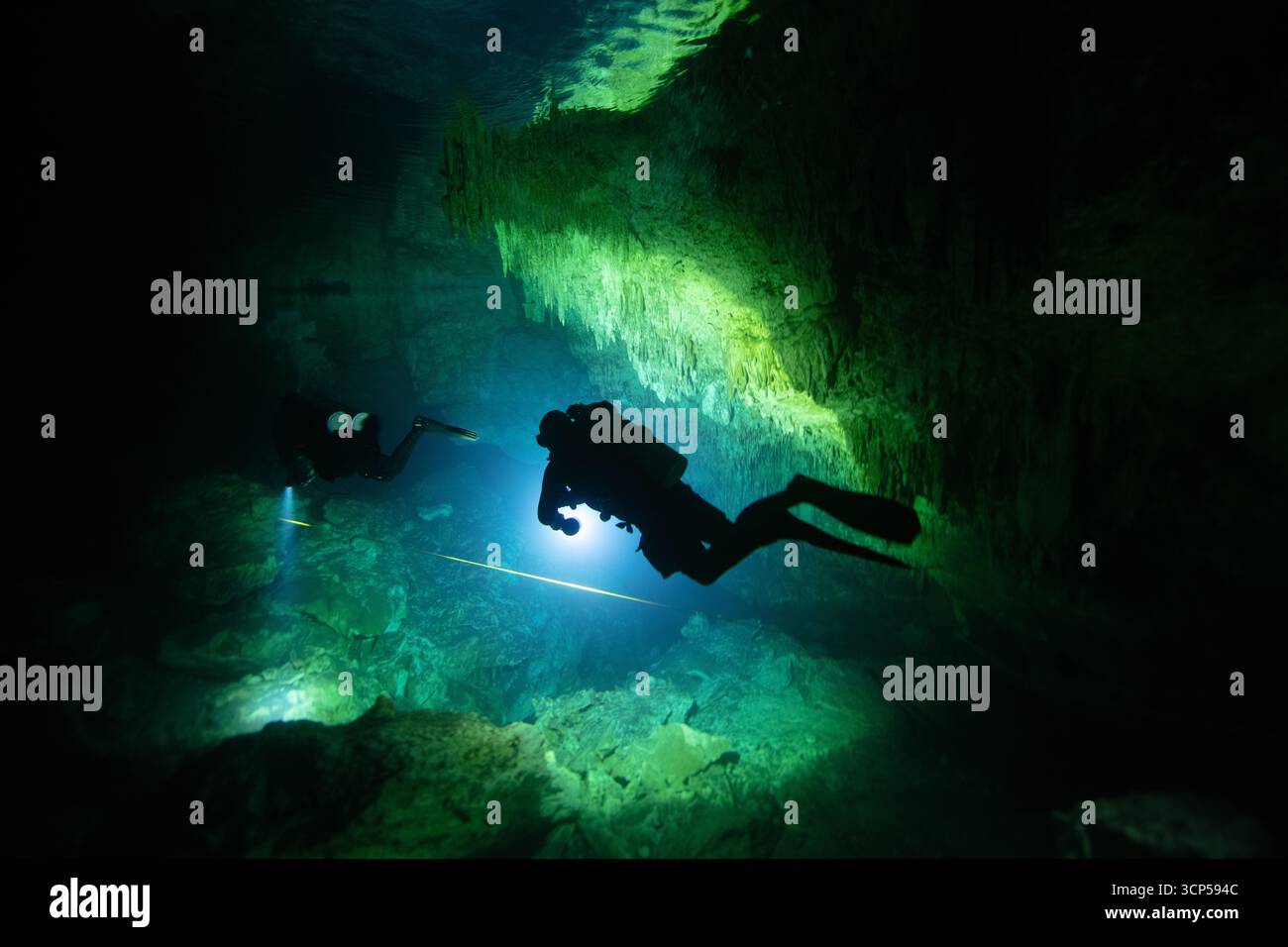 Cave diver in a Tajma Ha Cenote in the Yucatan Peninsula, Mexico Stock ...