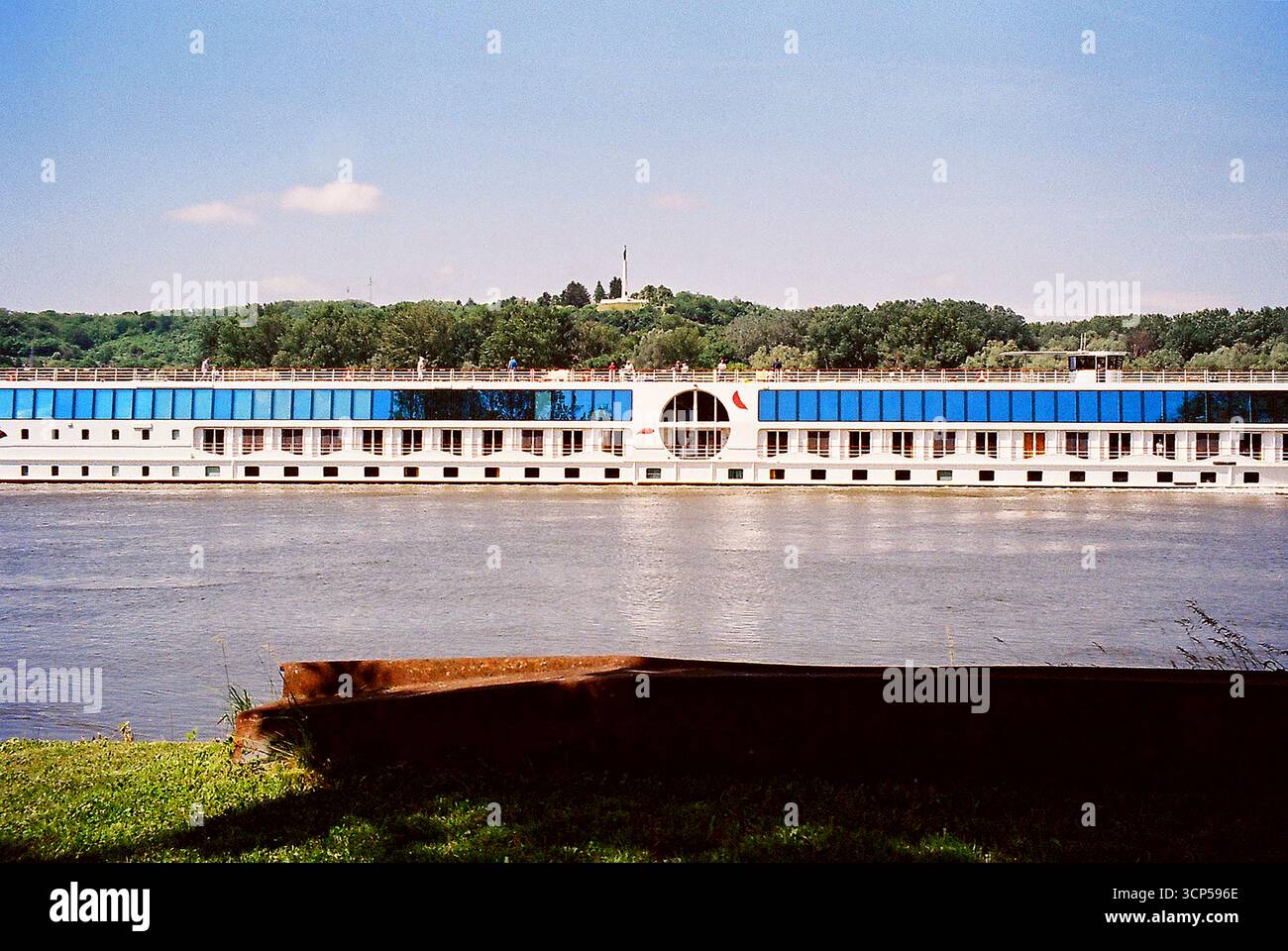 Cruise ship sailing on the Danube River near Batina, with the historic ...