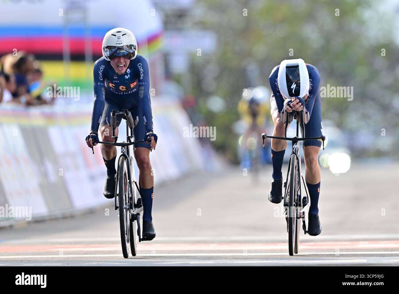 Kigali, Rwanda. 24th Sep, 2025. Spanish riders cross the finish line of ...