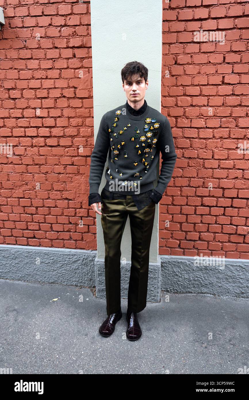 Milan, Crowds of people, influencers, and onlookers outside the Fendi ...