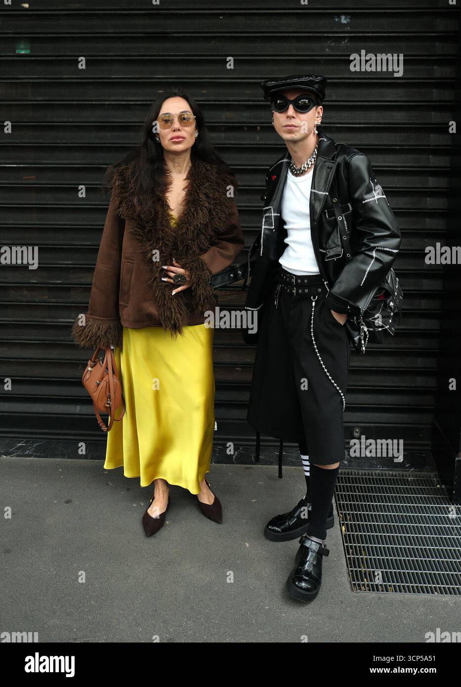 Milan, Crowds of people, influencers, and onlookers outside the Fendi ...