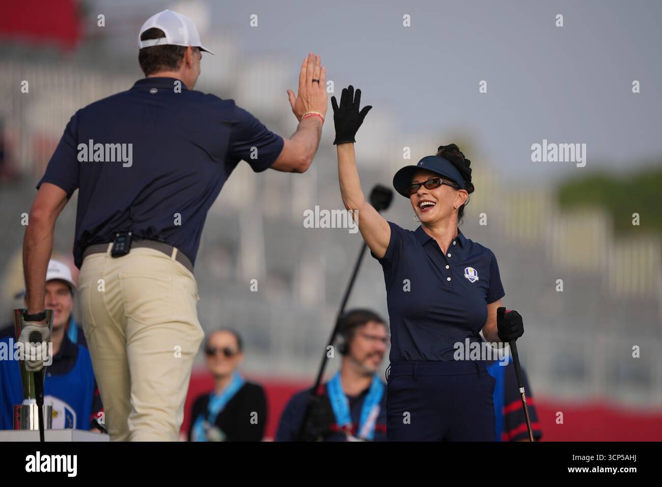 Europe's Pau Gasol and Catherine Zeta-Jones high five on the first hole ...
