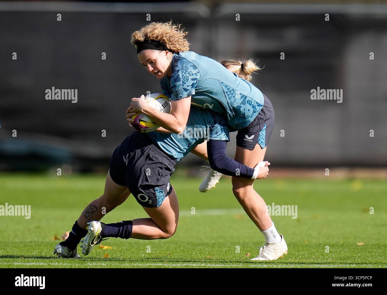 England's Megan Jones tackles Ellie Kildunne (right) during a training ...