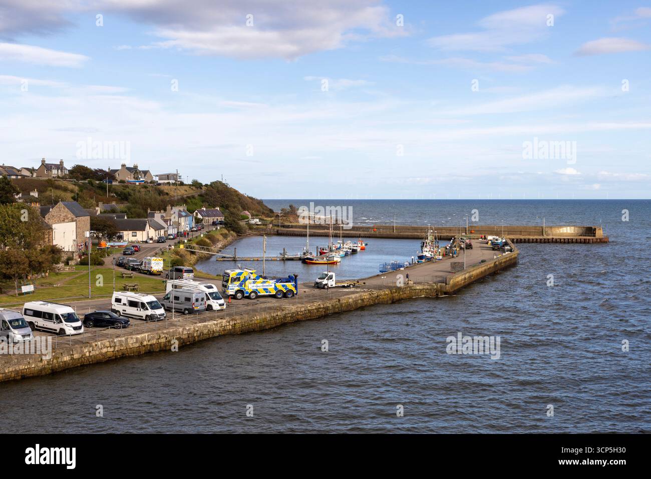The historic fishing village and harbour of Helmsdale, nestled on the ...