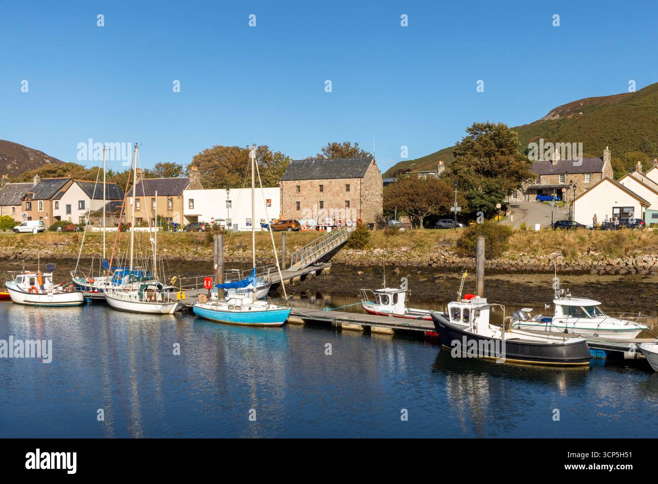 The historic fishing village and harbour of Helmsdale, nestled on the ...