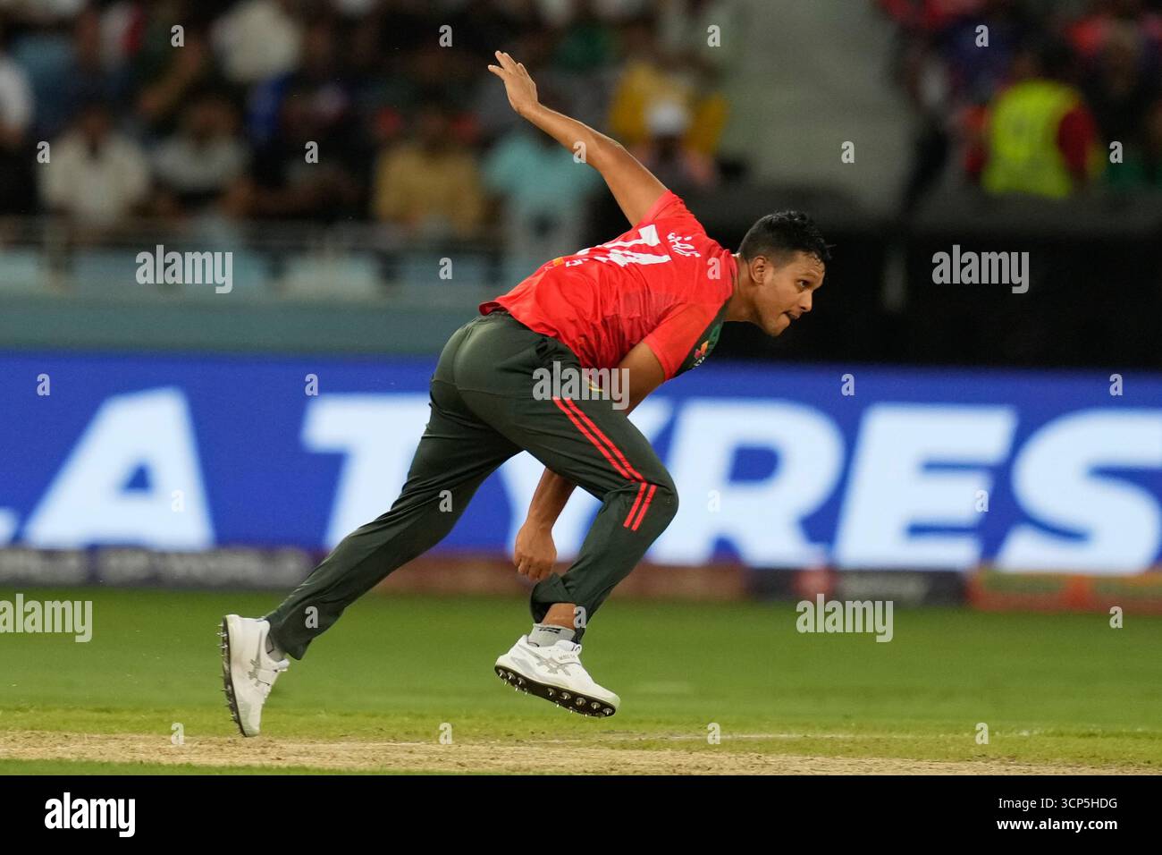 Bangladesh's Mohammad Saifuddin bowls a delivery during the Asia Cup cricket match between India ...