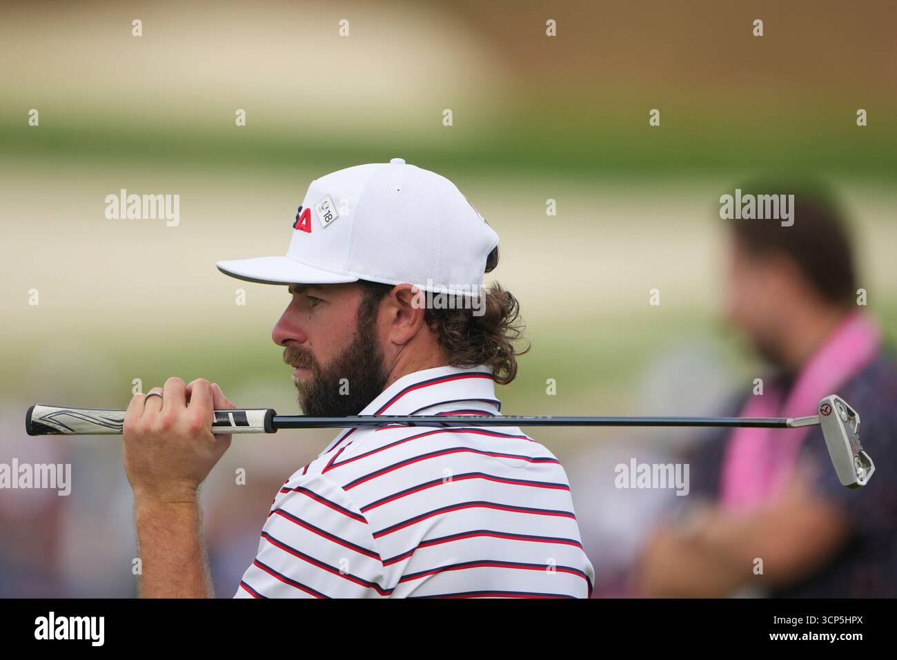 Cameron Young waits to putt on the first hole during a practice round ...