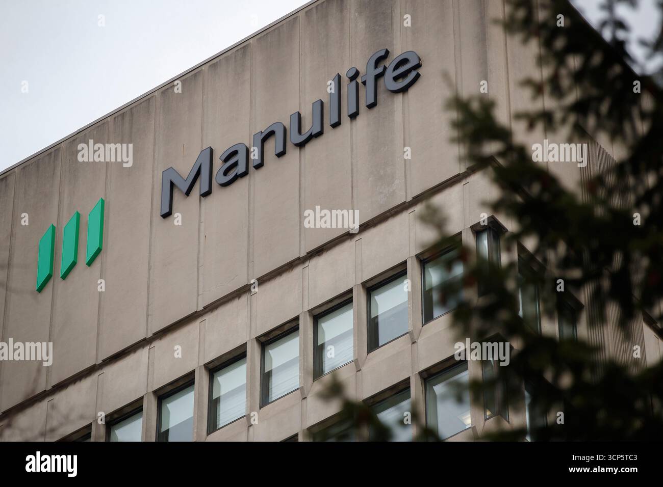 Signage is seen on Manulife Financial Corp.'s office tower in Toronto ...