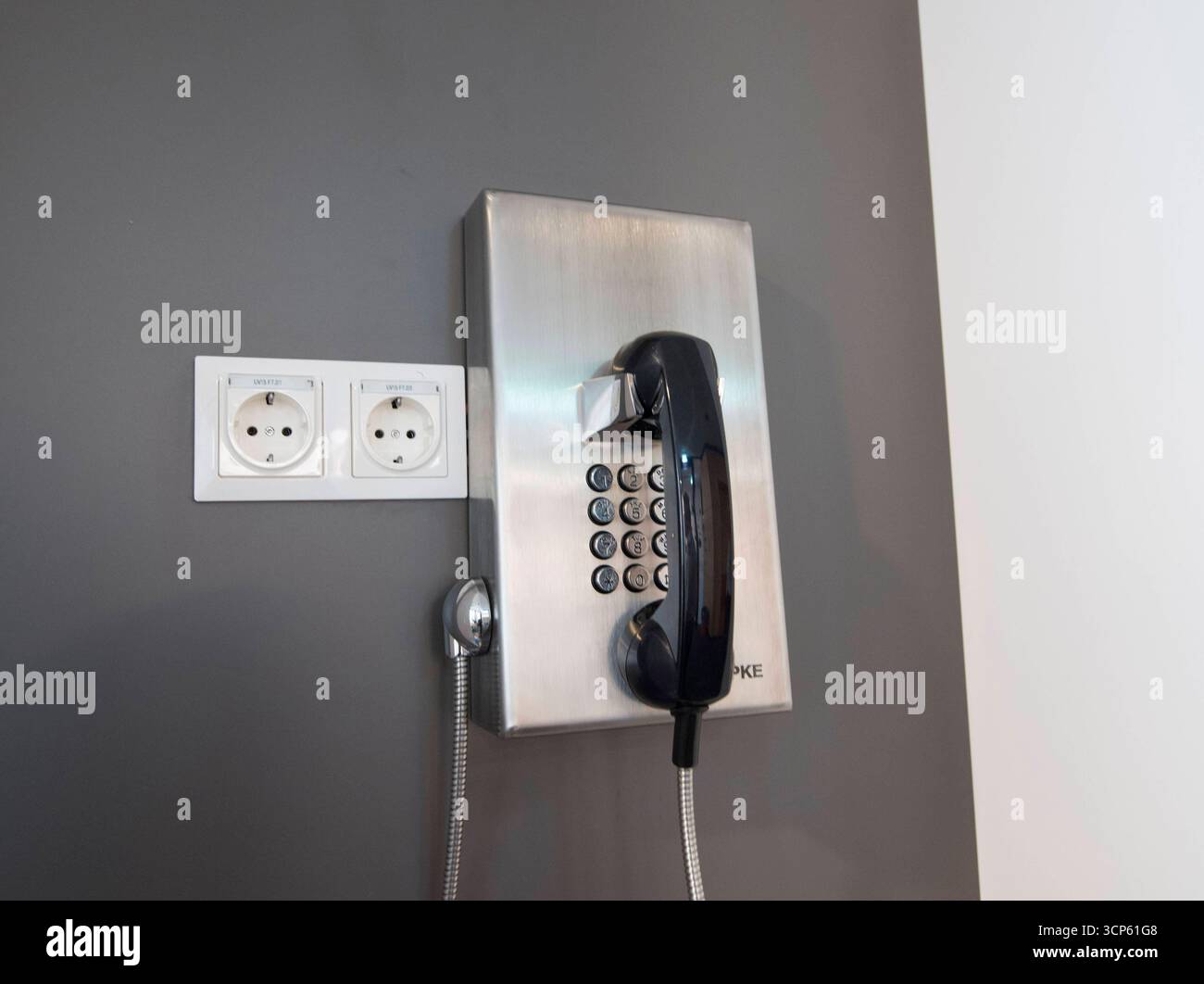 a vintage landline telephone for calling, retro phone set on a table a ...