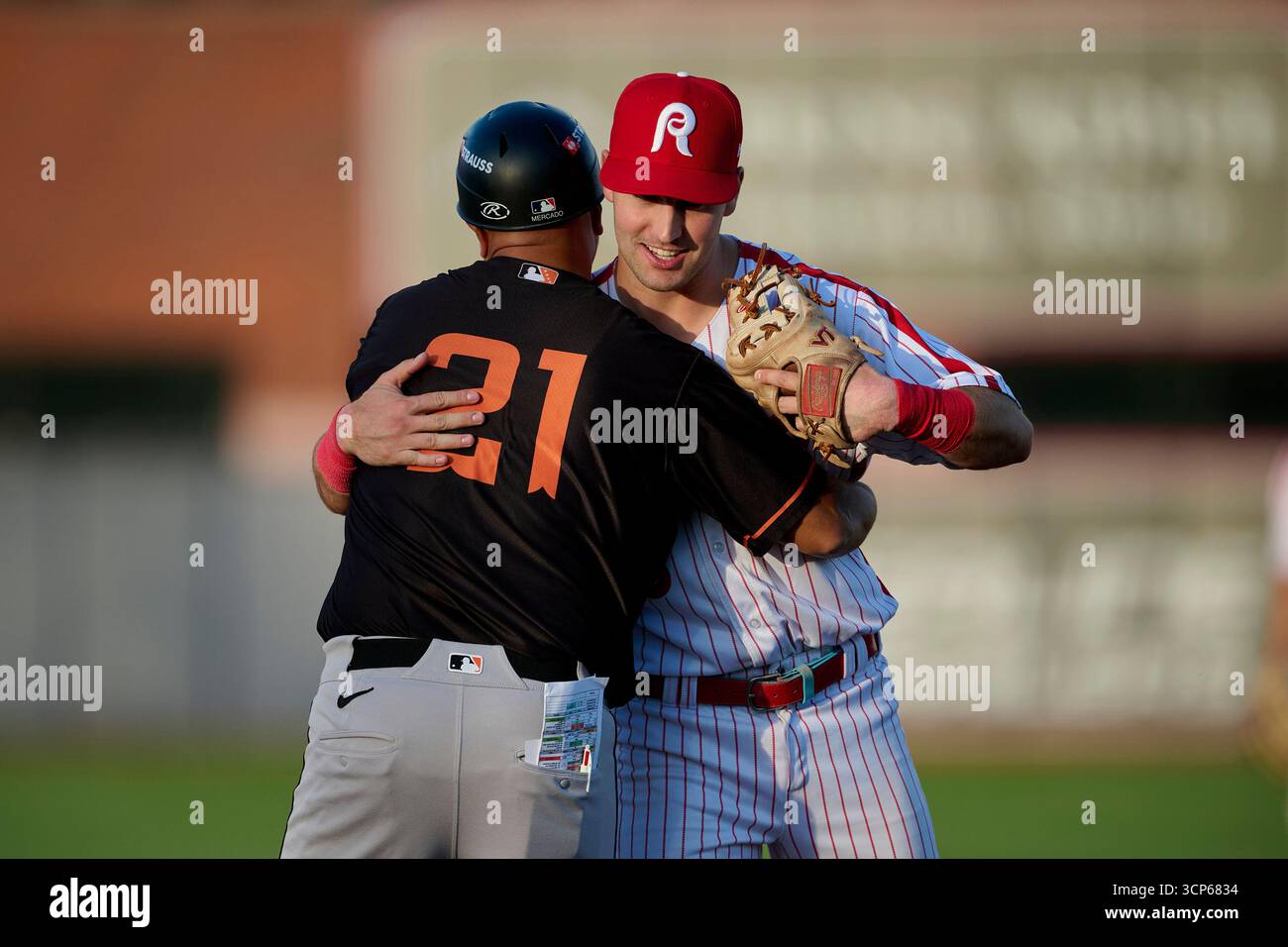 Reading Fightin Phils third baseman Carson DeMartini (6) greets manager ...