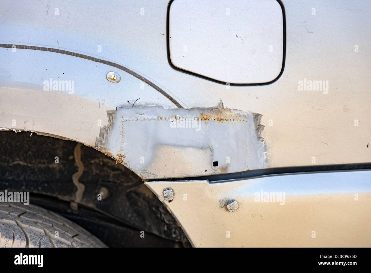 Weld seam on gray car part. Poor repair service Stock Photo - Alamy
